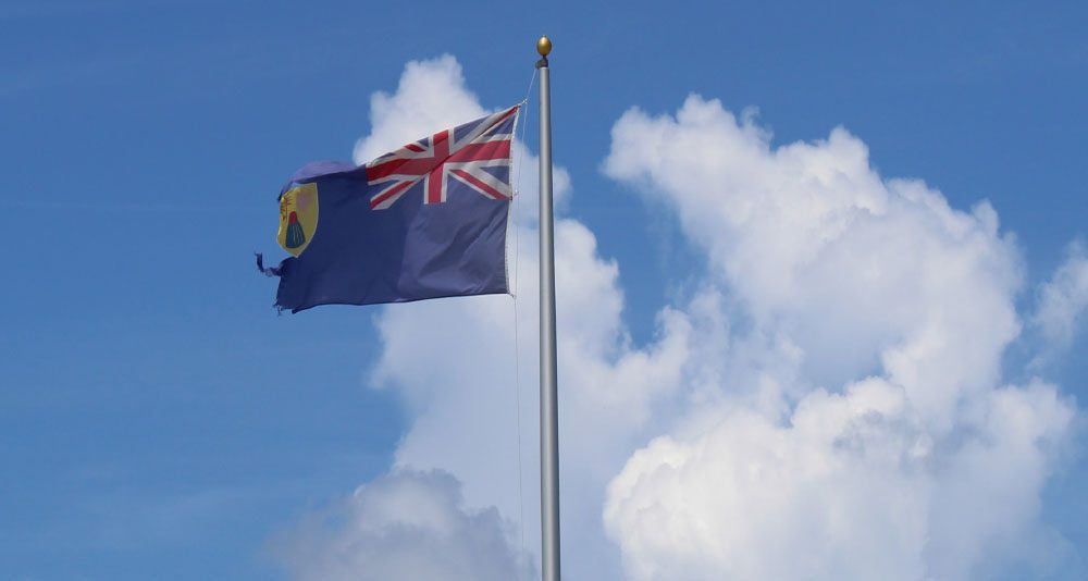 Dignity of the Turks and Caicos Flag, take the tattered one down ...